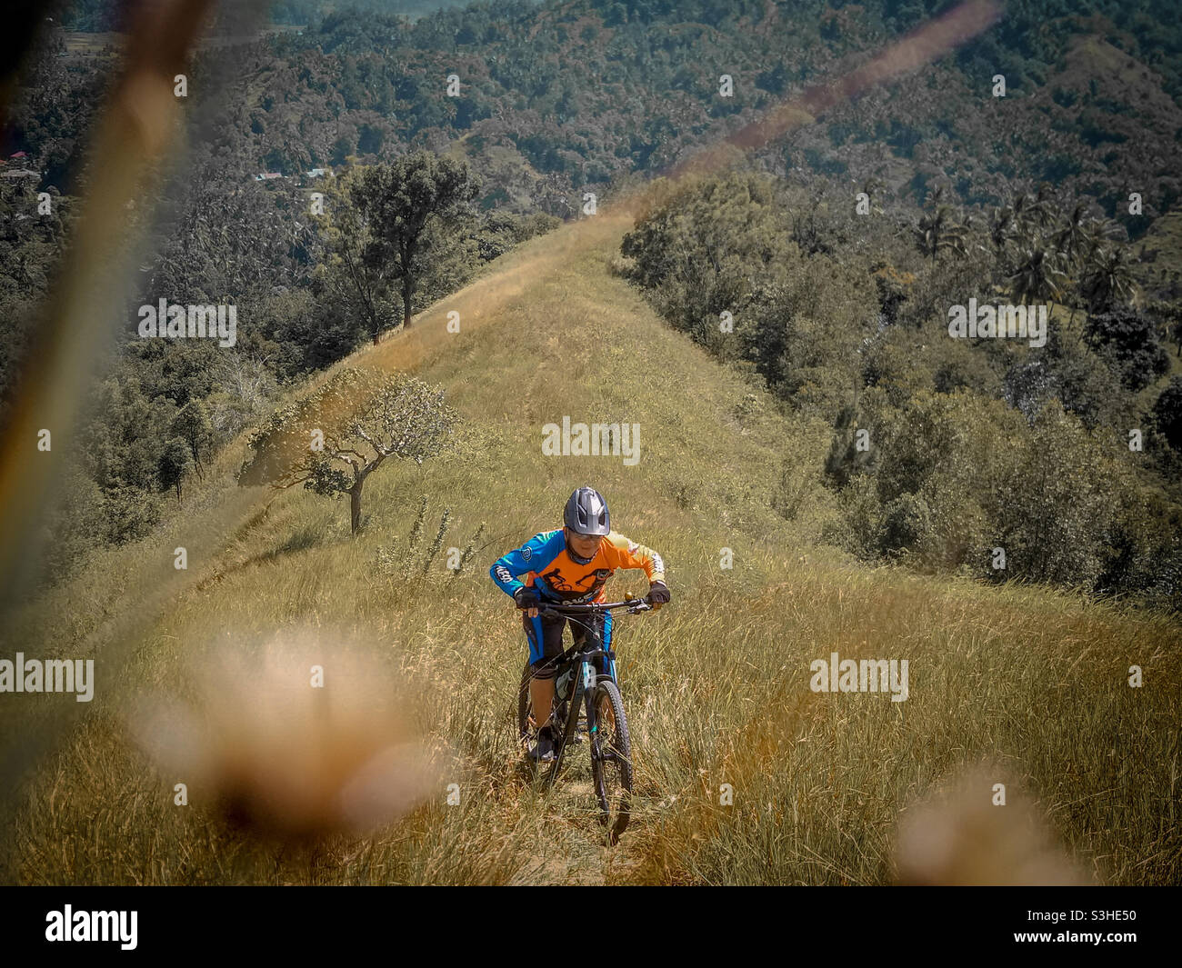 Cycling in hills hi-res stock photography and images - Alamy