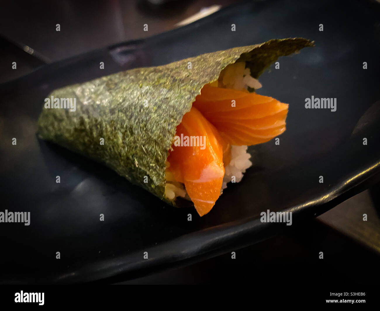 Hand held sushi hi-res stock photography and images - Alamy