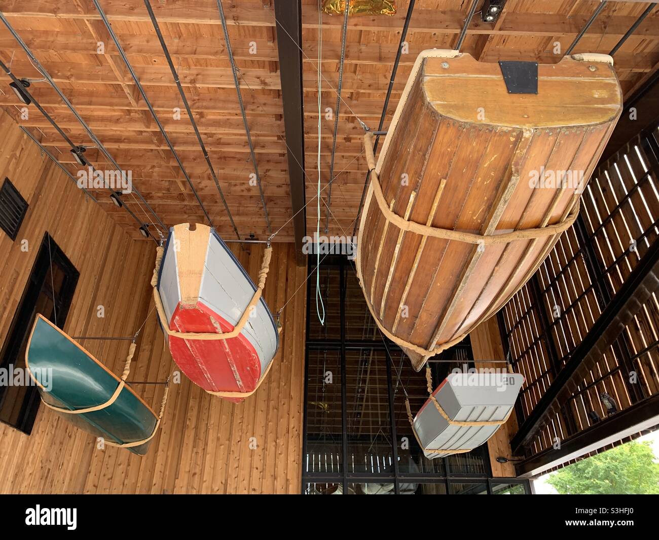 Hanging wooden boats Stock Photo - Alamy