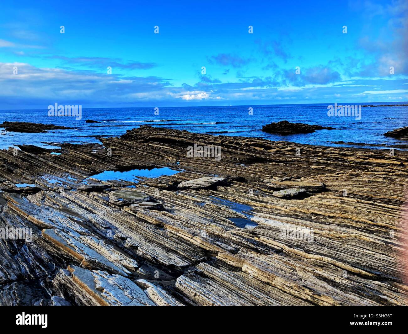 Rocks in the beach of Sakoneta Stock Photo - Alamy