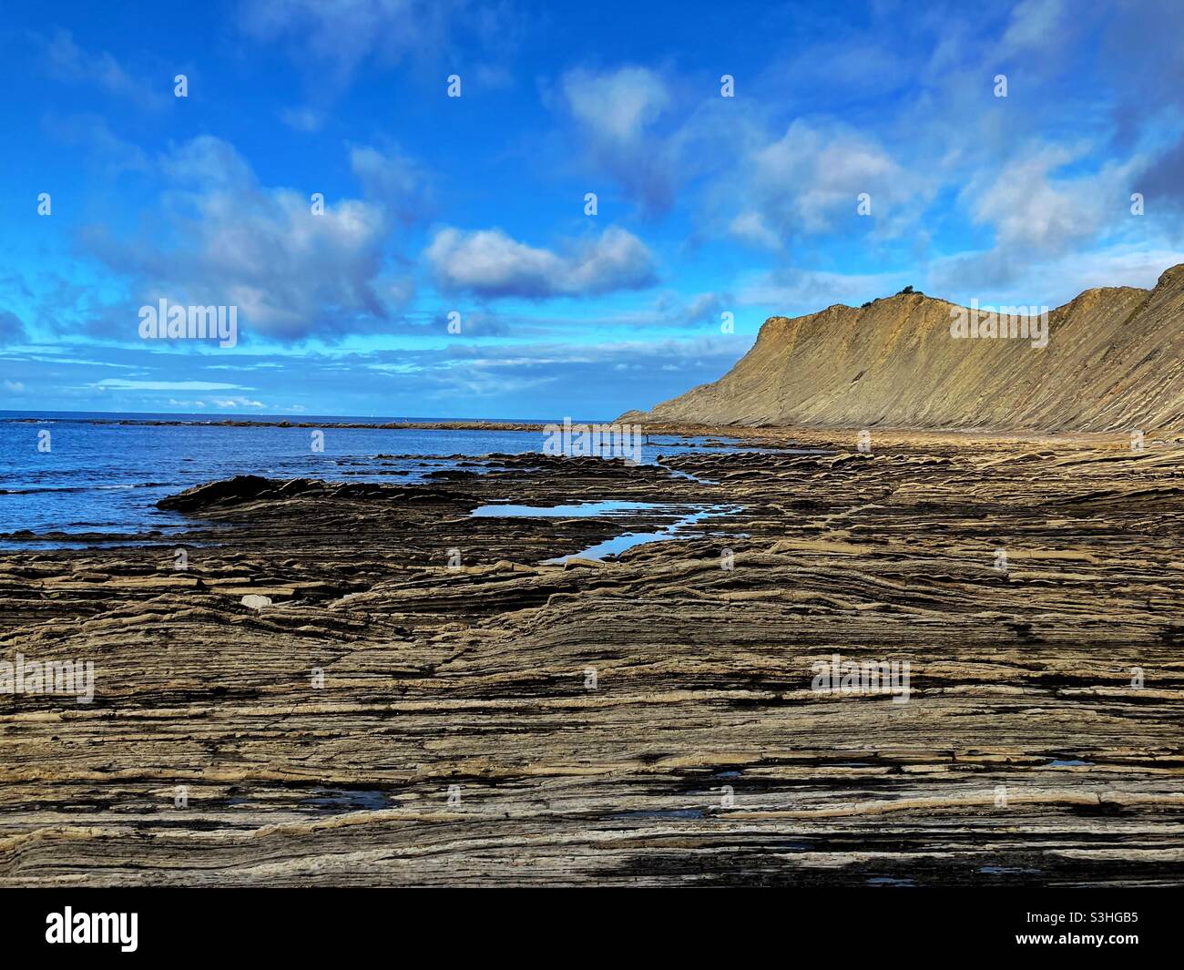 Rocks in the Sakoneta beach Stock Photo - Alamy