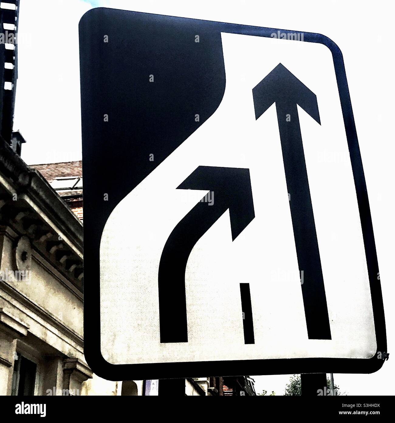 Merging traffic sign hi-res stock photography and images - Alamy