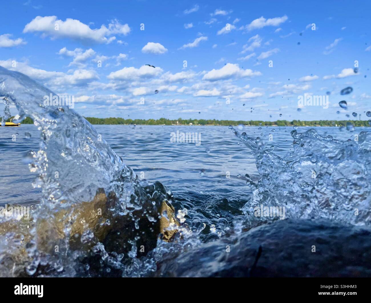 Wave hitting rocks on Cross Lake shoreline in Minnesota. Come enjoy ...