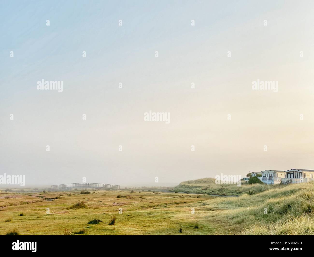 View across the marshes at the River Crigyll, traeth Crigyll, Rhosneigr ...