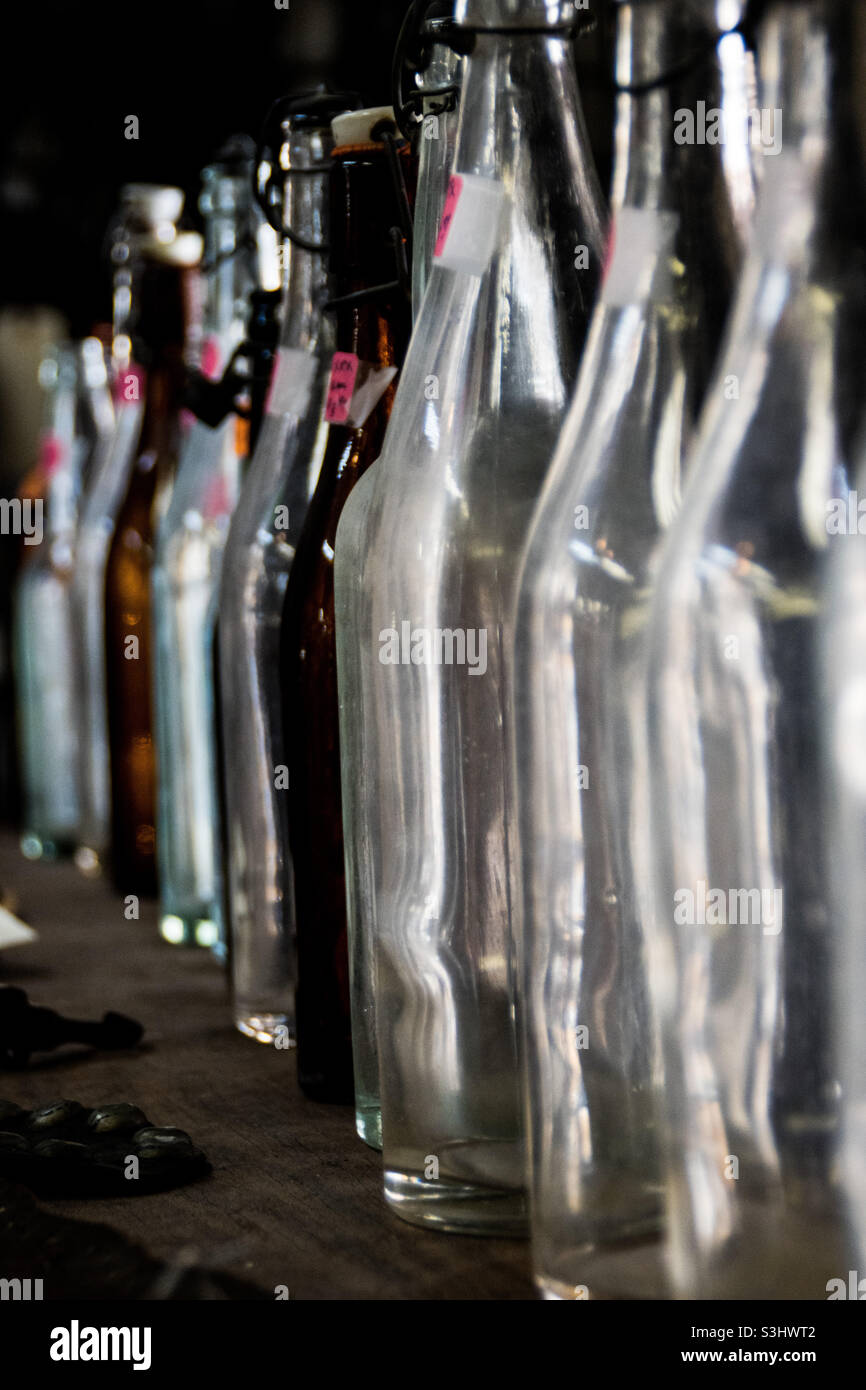 Row of bottles hi-res stock photography and images - Alamy