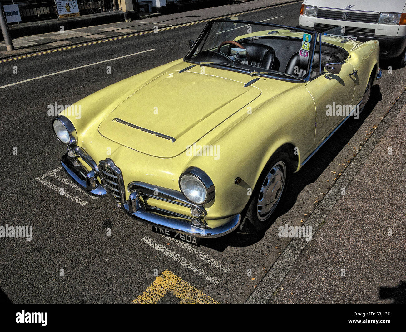 A Yellow, 1963, Alfa Romeo Spyder Sports Car, parked on the Seafront at ...