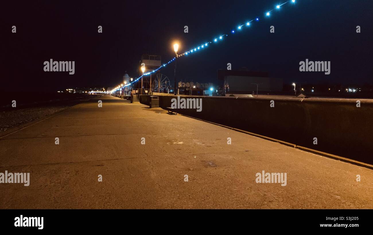 Beachfront at night Stock Photo - Alamy