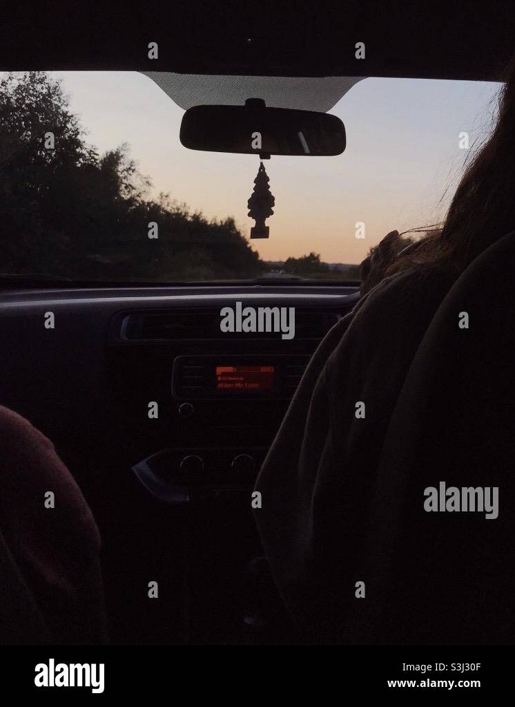 Car window sunset Stock Photo - Alamy