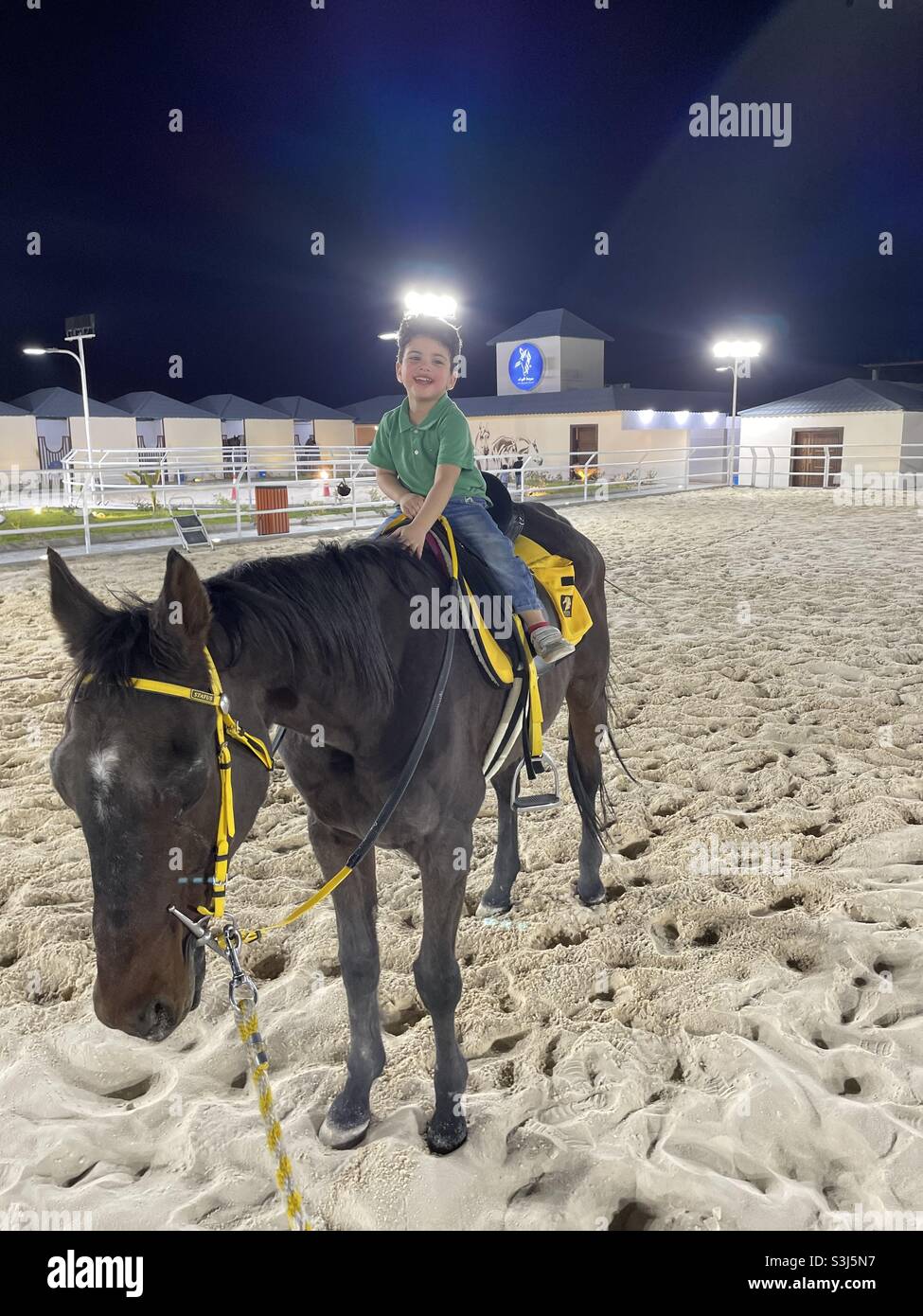 Boy riding on horse hi-res stock photography and images - Alamy