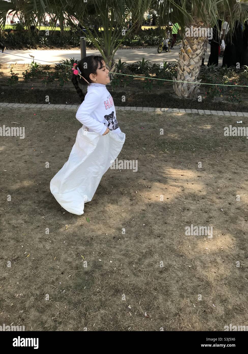 Jump by beautiful child Stock Photo - Alamy