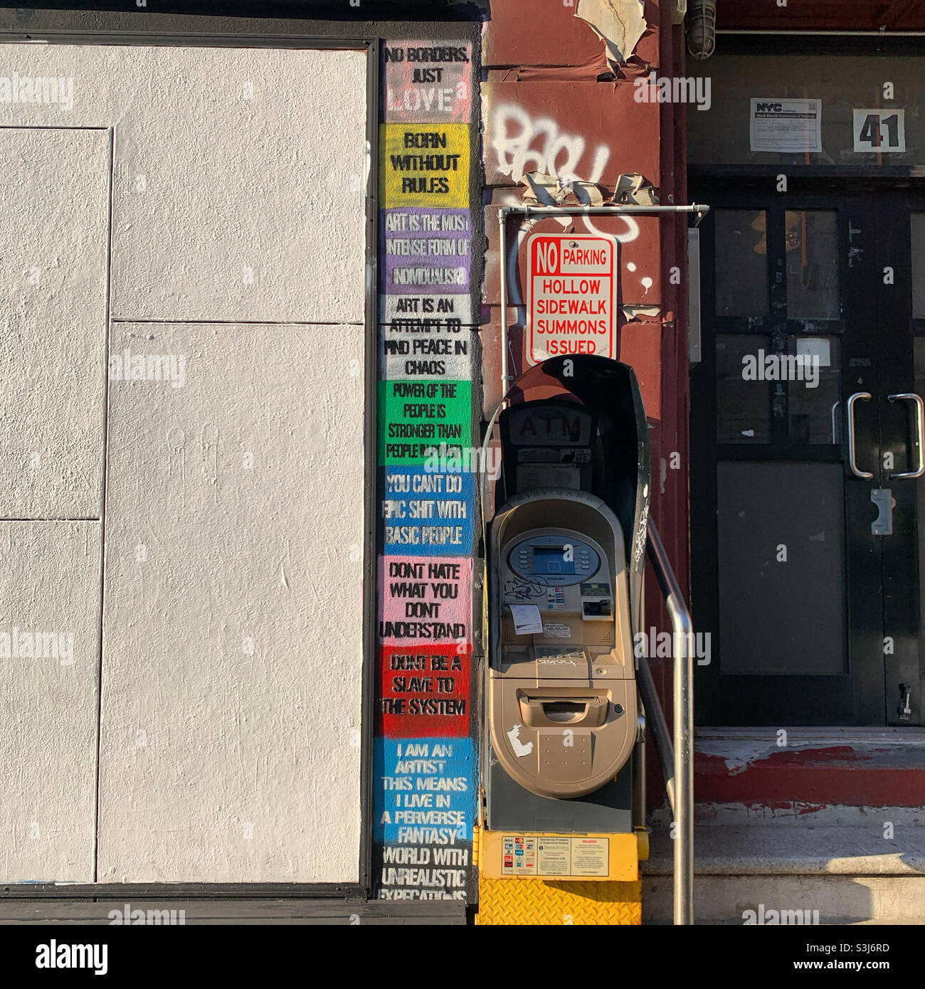 August, 2021, colorful inspirational signs next to an ATM, NoLita ...