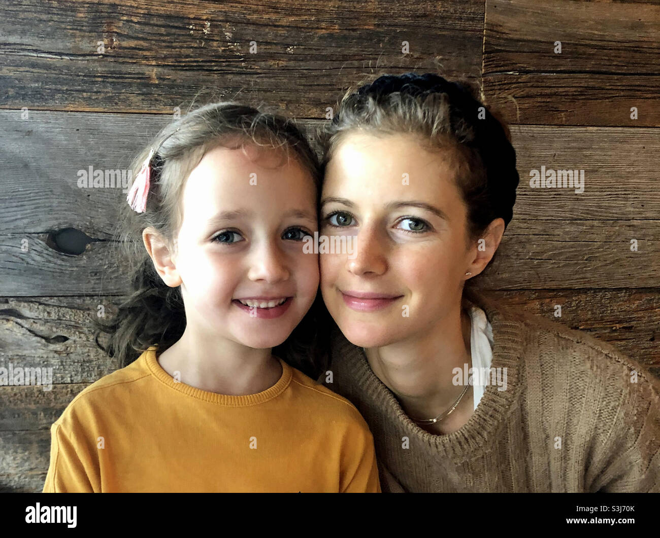 Mother and daughter look-alikes Stock Photo - Alamy