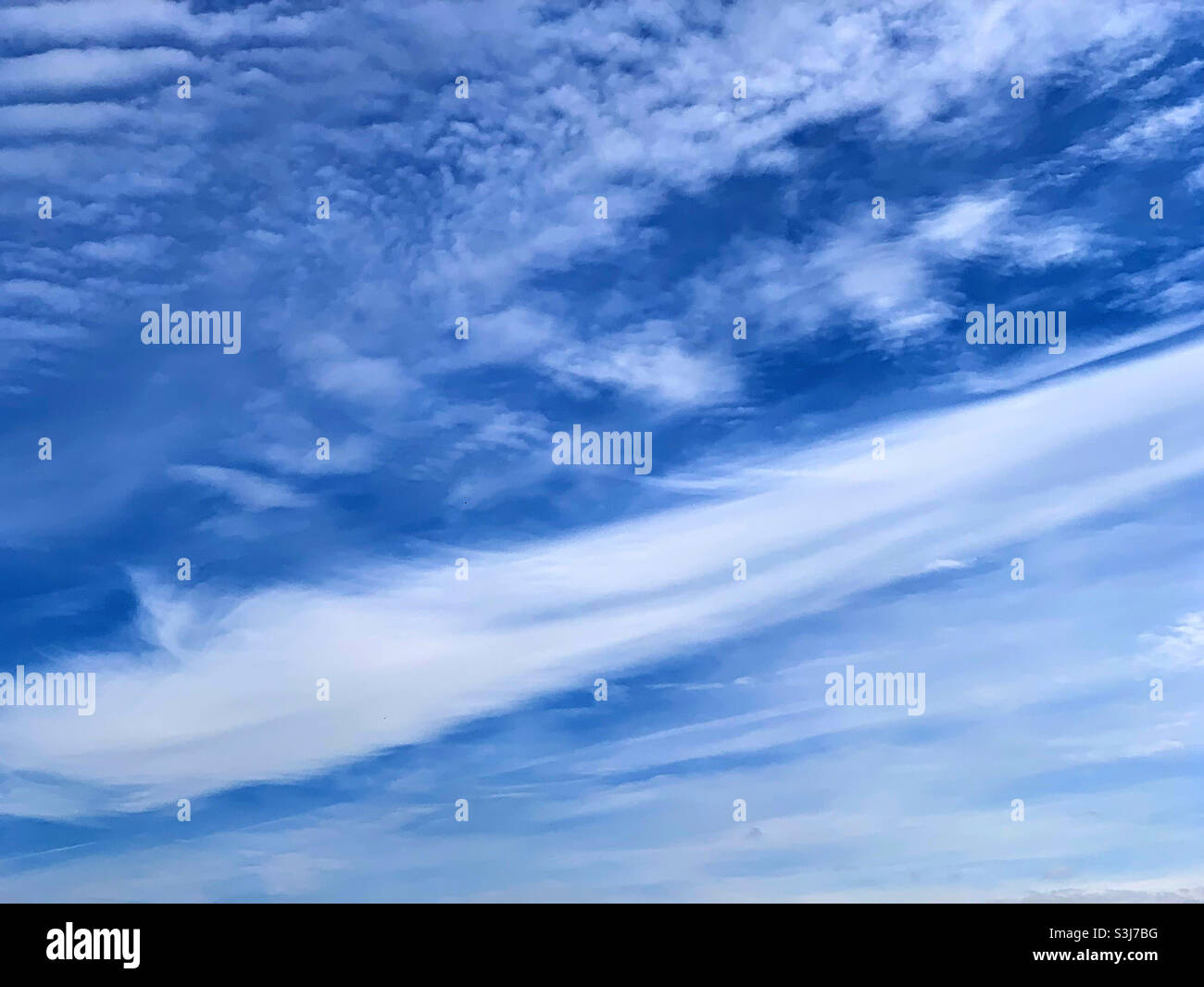 interesting clouds of different shapes on the autumn sky Stock Photo ...