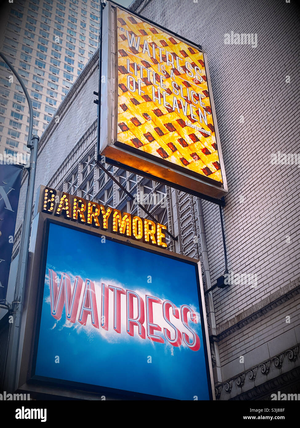 The colorful marquee and electrical signs at the Barrymore theater for ...