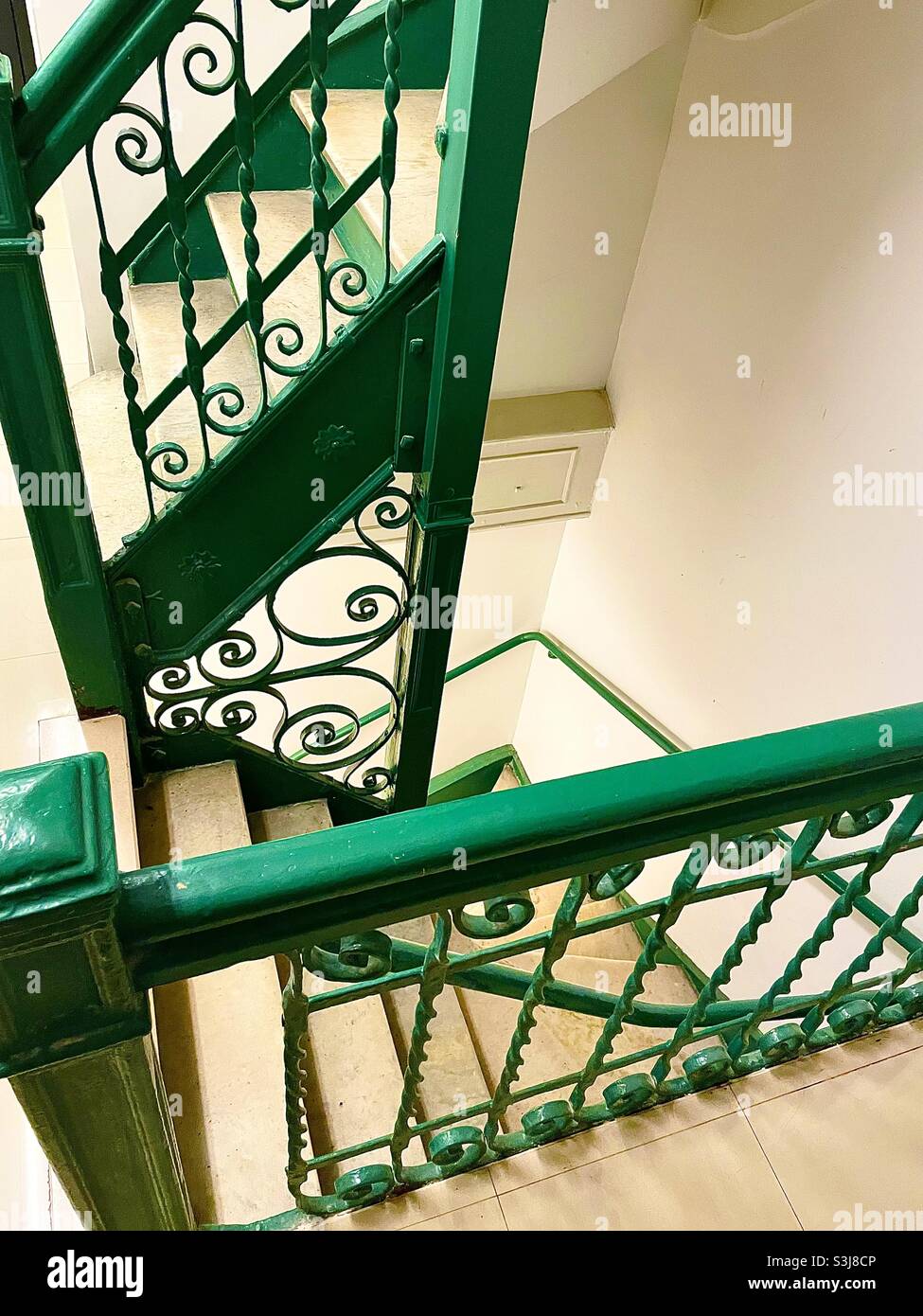 Green wrought iron stair rails Stock Photo - Alamy