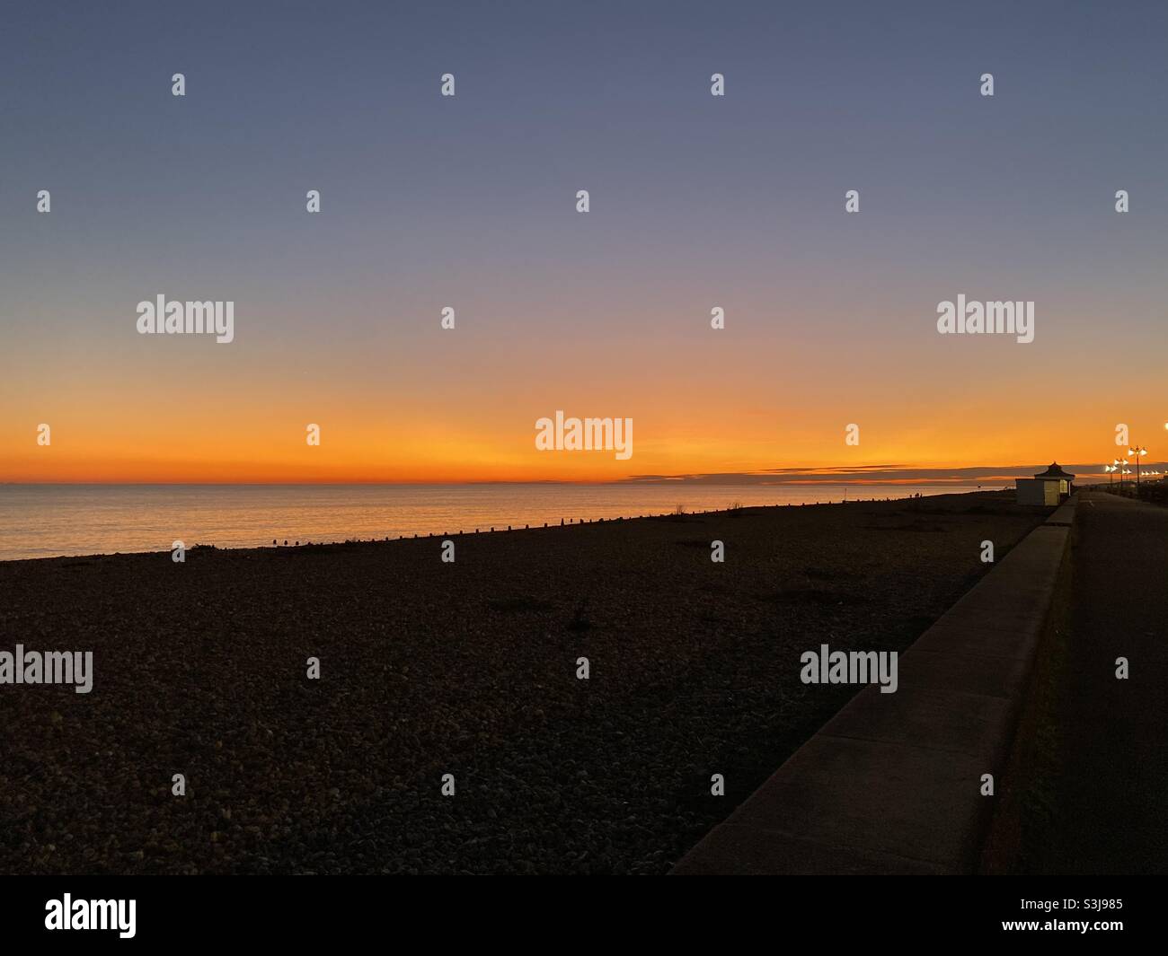 Sunset at the beach Stock Photo - Alamy