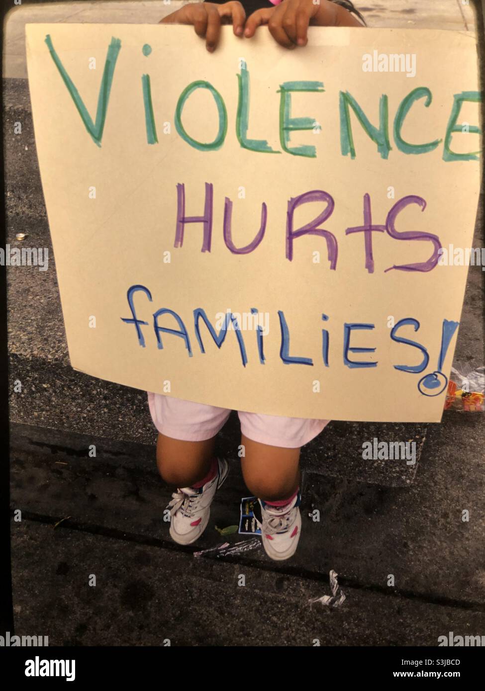 Girl with anti violence sign Stock Photo - Alamy