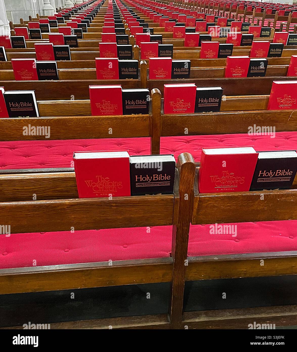 Pews and hymnals in the Cadet Chapel at United States military Academy ...
