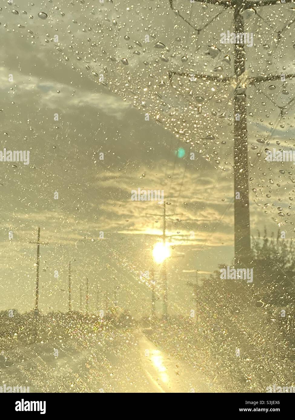 Sunny day, with dew clouding window Stock Photo - Alamy