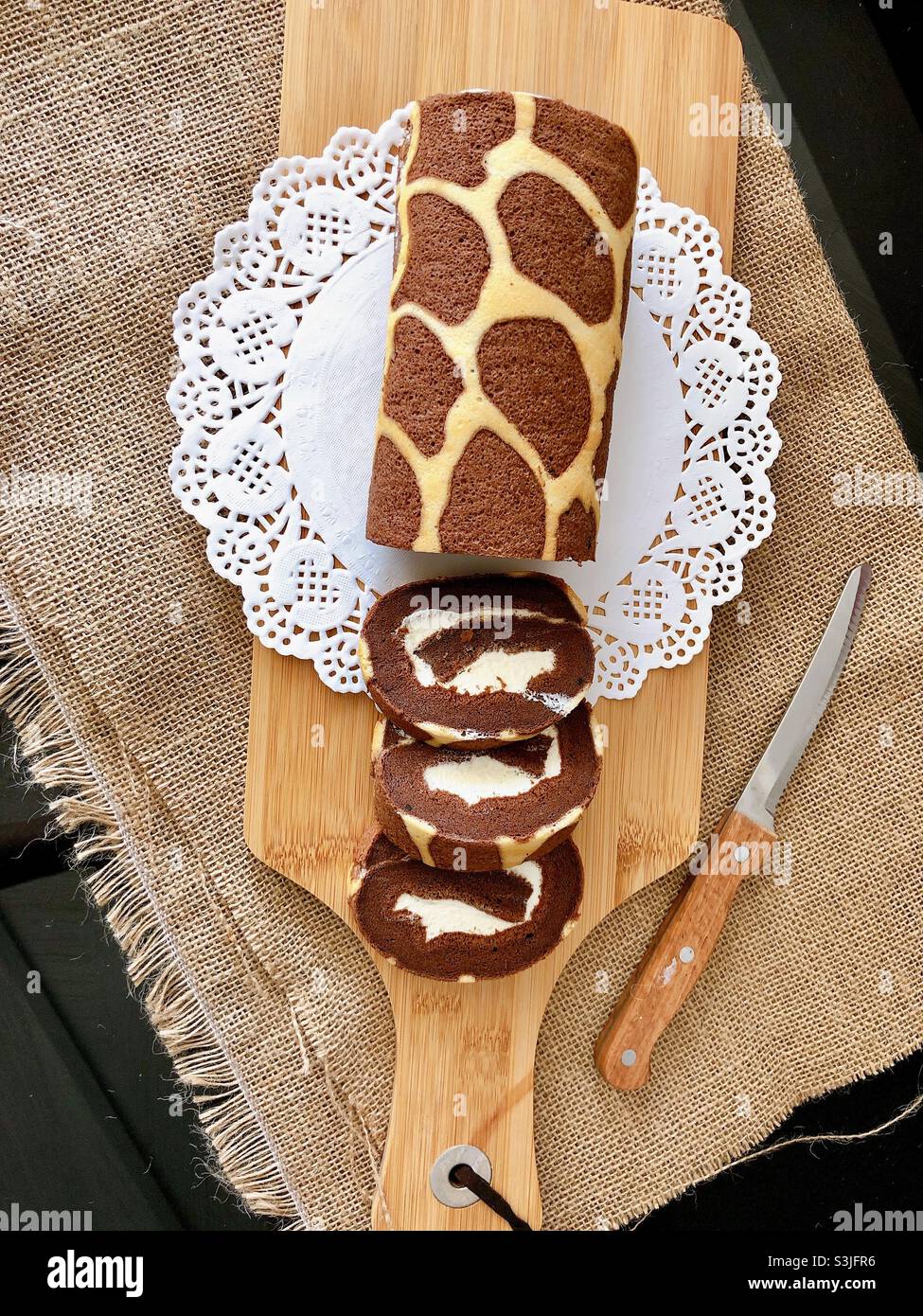 Giraffe roll hi-res stock photography and images - Alamy