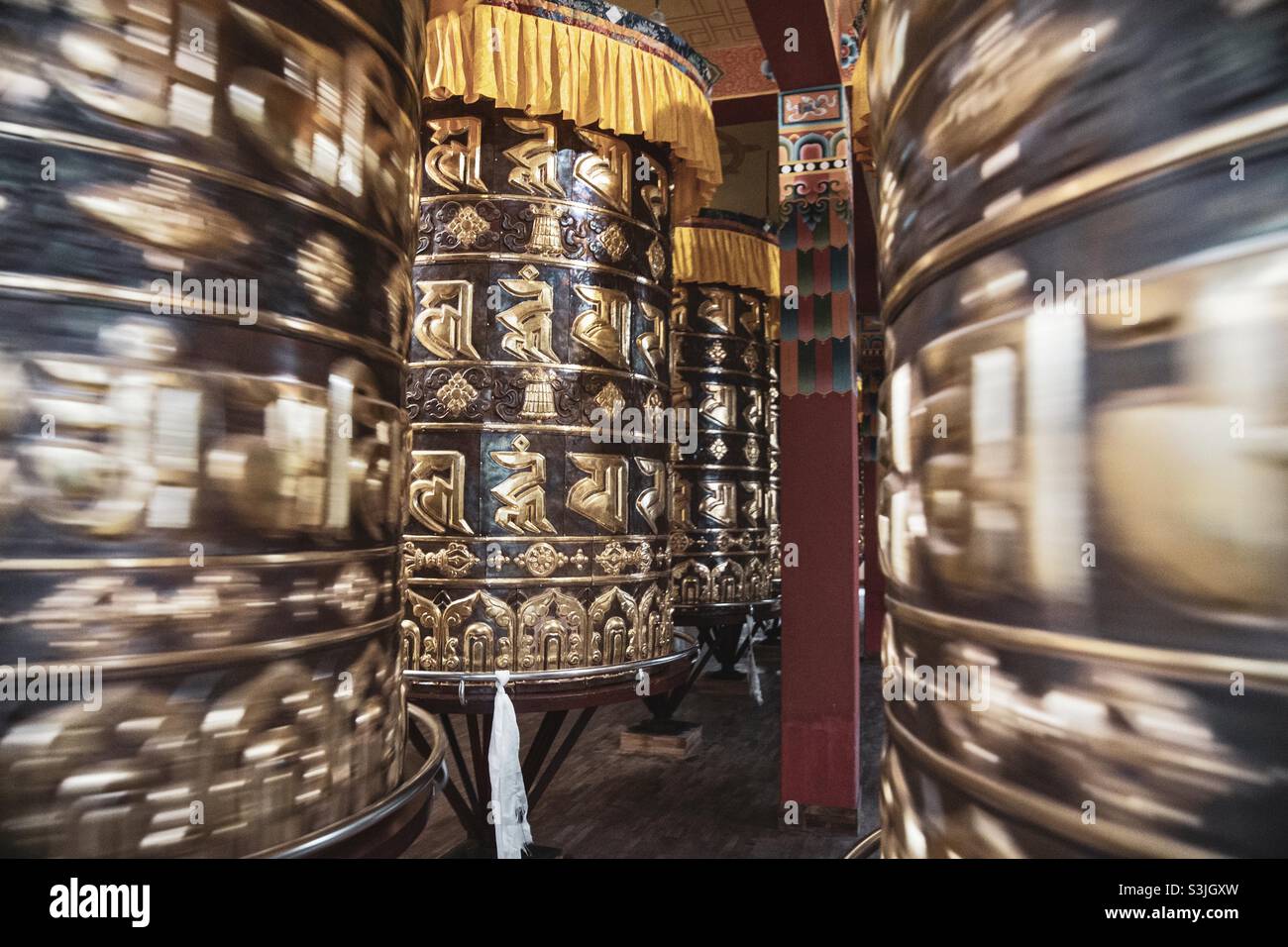 Prayer wheels in a monastery in Sikkim, India Stock Photo - Alamy
