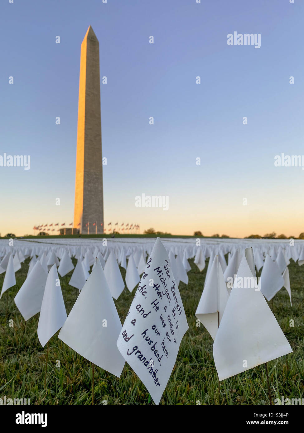 Hundreds of thousands of white flags representing the hundreds of ...