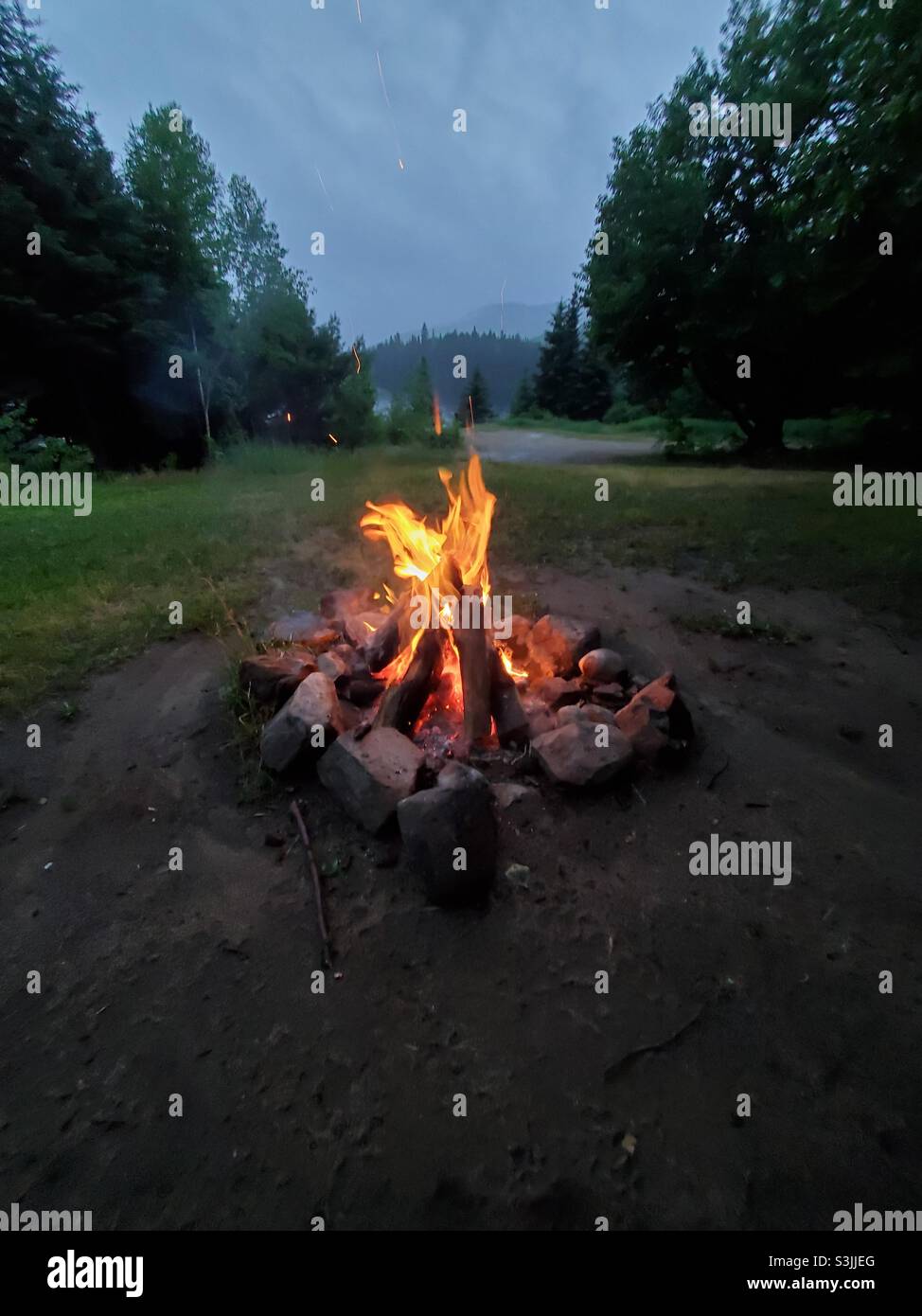 Fire in rain hi-res stock photography and images - Alamy