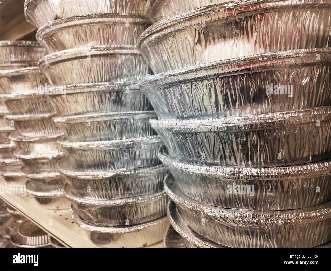 Stacks of 10 storage containers for sale in a discount store, USA, 2021 ...