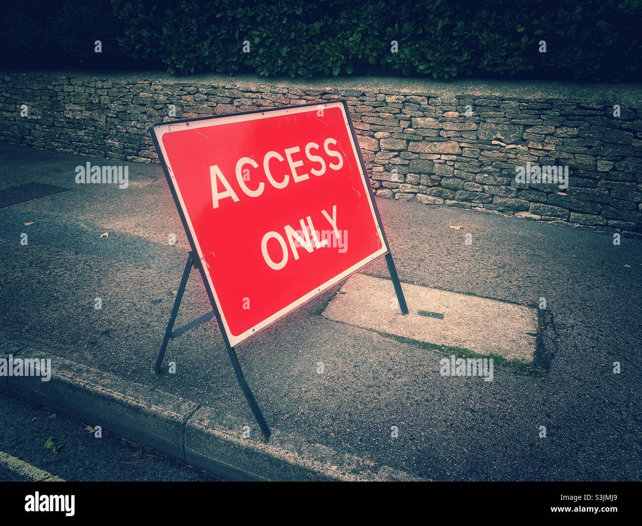 ACCESS ONLY sign on a road in England. Looks like the road ahead is ...