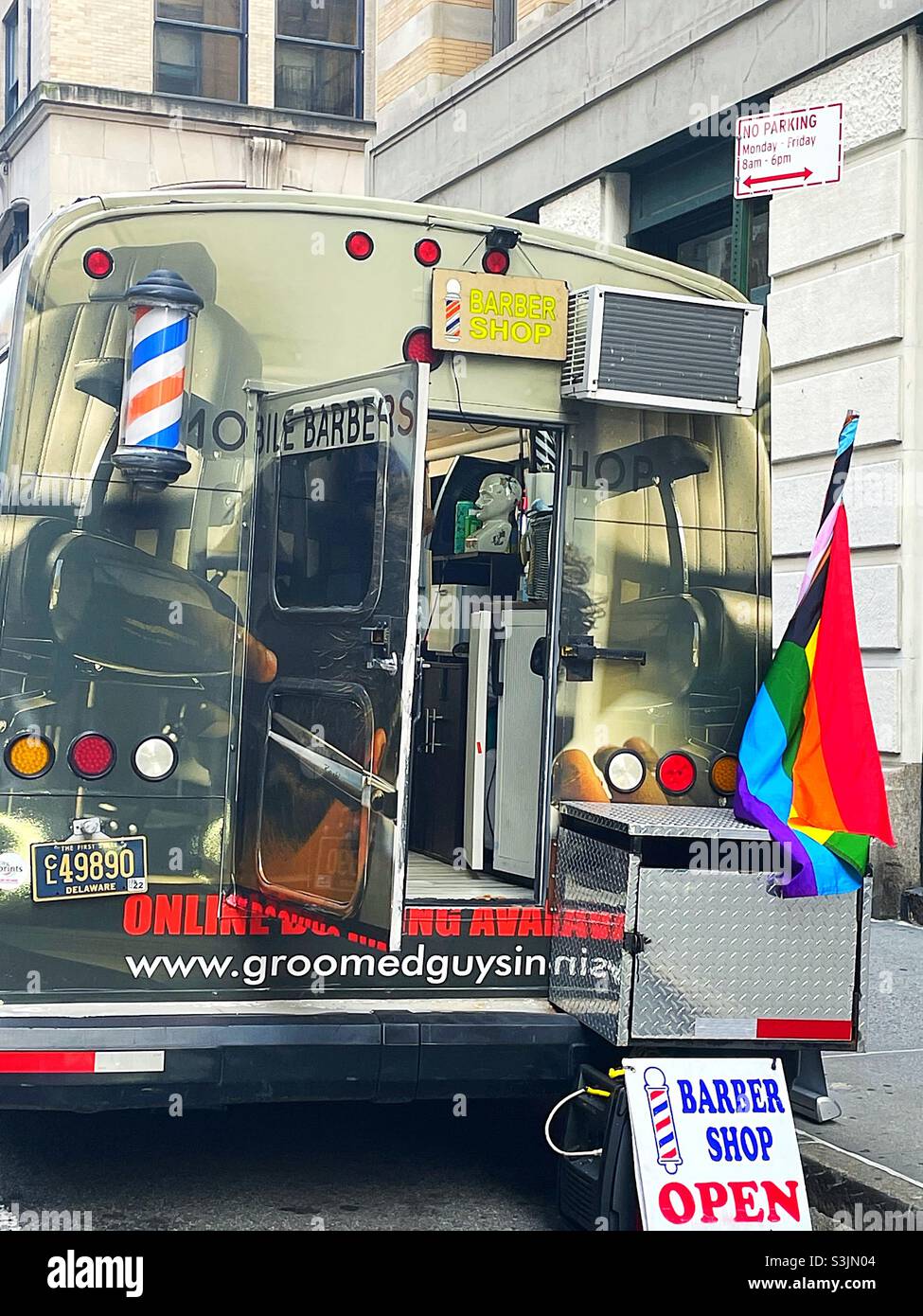 A mobile barber shop parked on the street in Soho, 2021, New York City ...