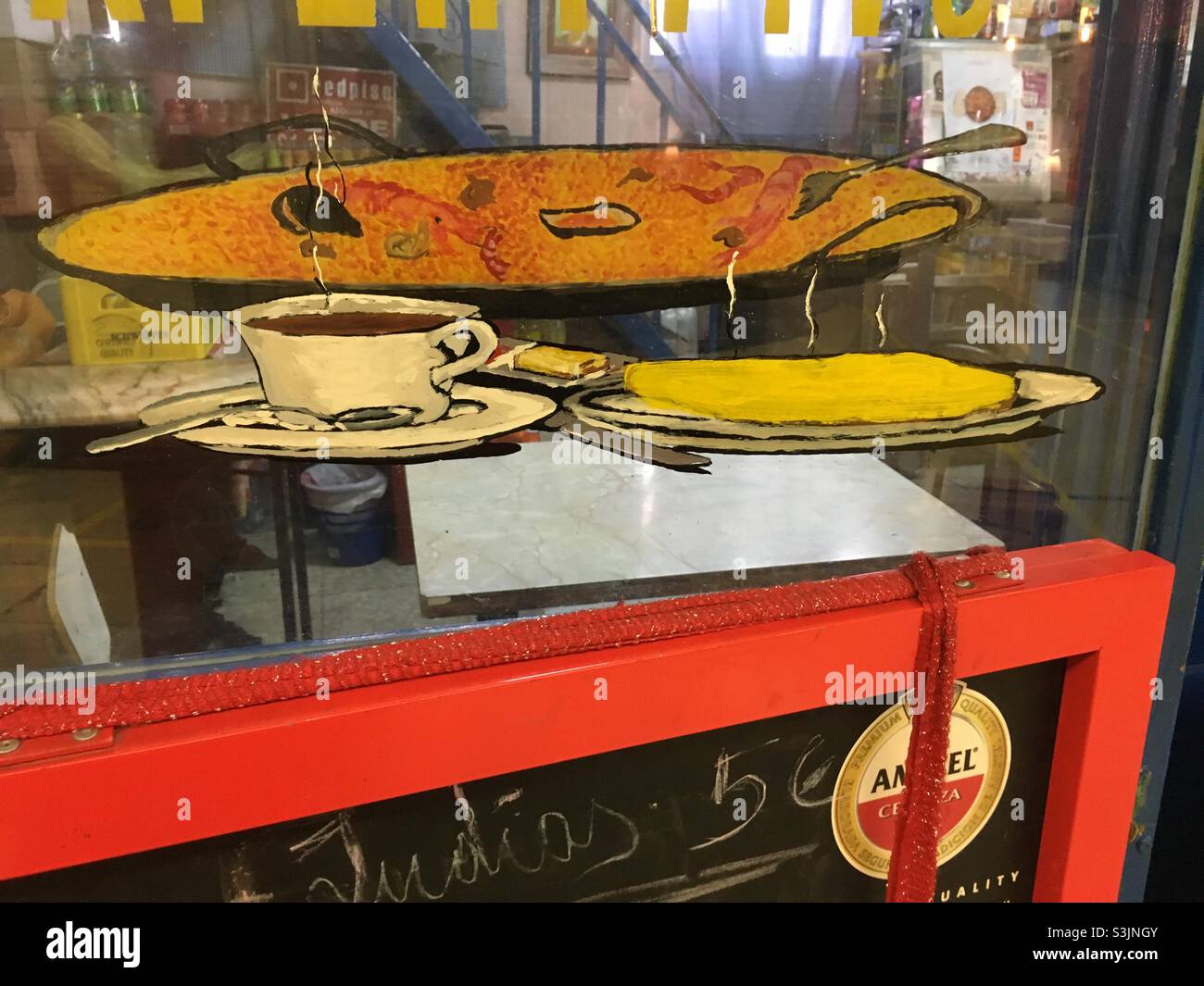 Restaurant painted window illustrates coffee and tortillas frittata ...