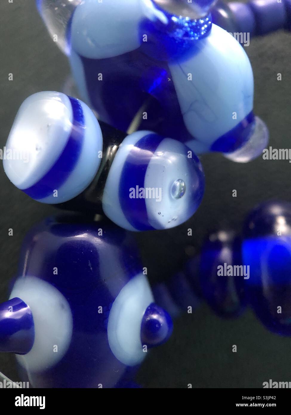 Handmade Blue Glass Beads Stock Photo - Alamy