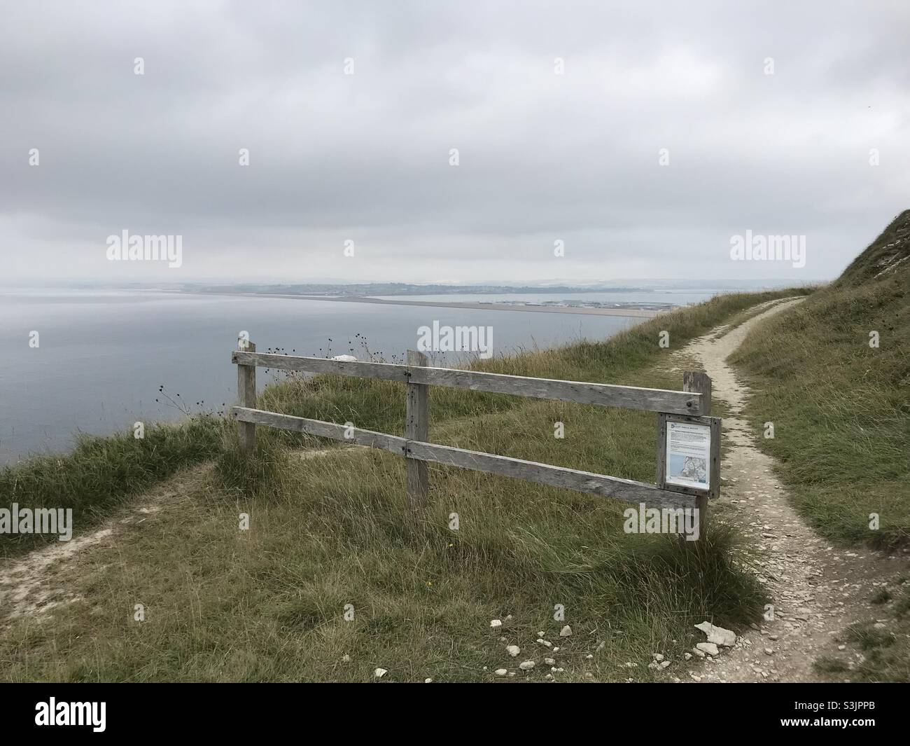 Closed path on the south west path, looking out from Portland, showing ...