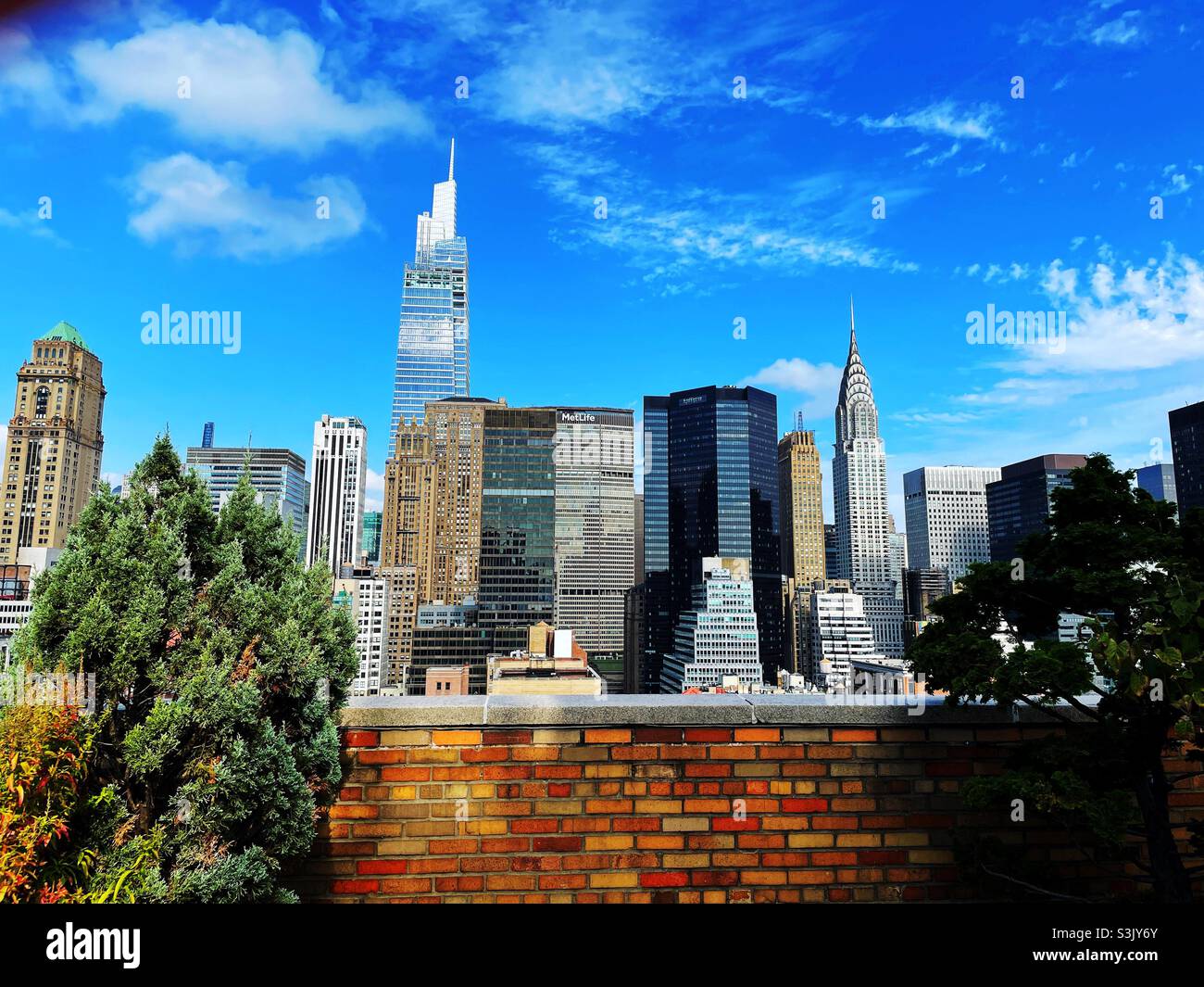 The midtown Manhattan skyline as seen from a luxury apartment house ...