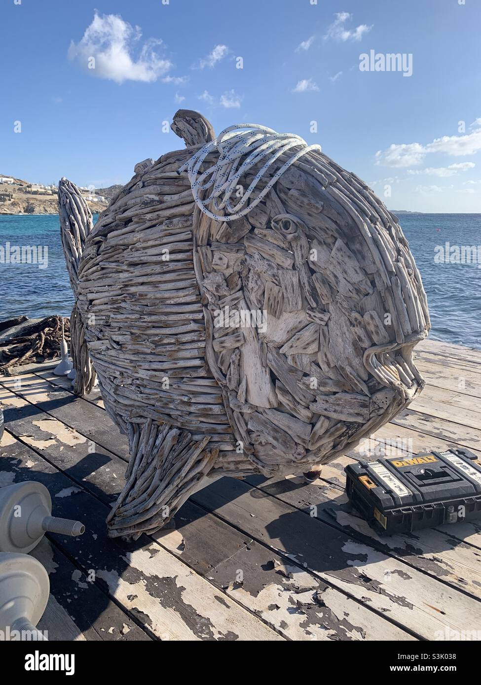 Large wooden fish sculpture in Mykonos Stock Photo - Alamy