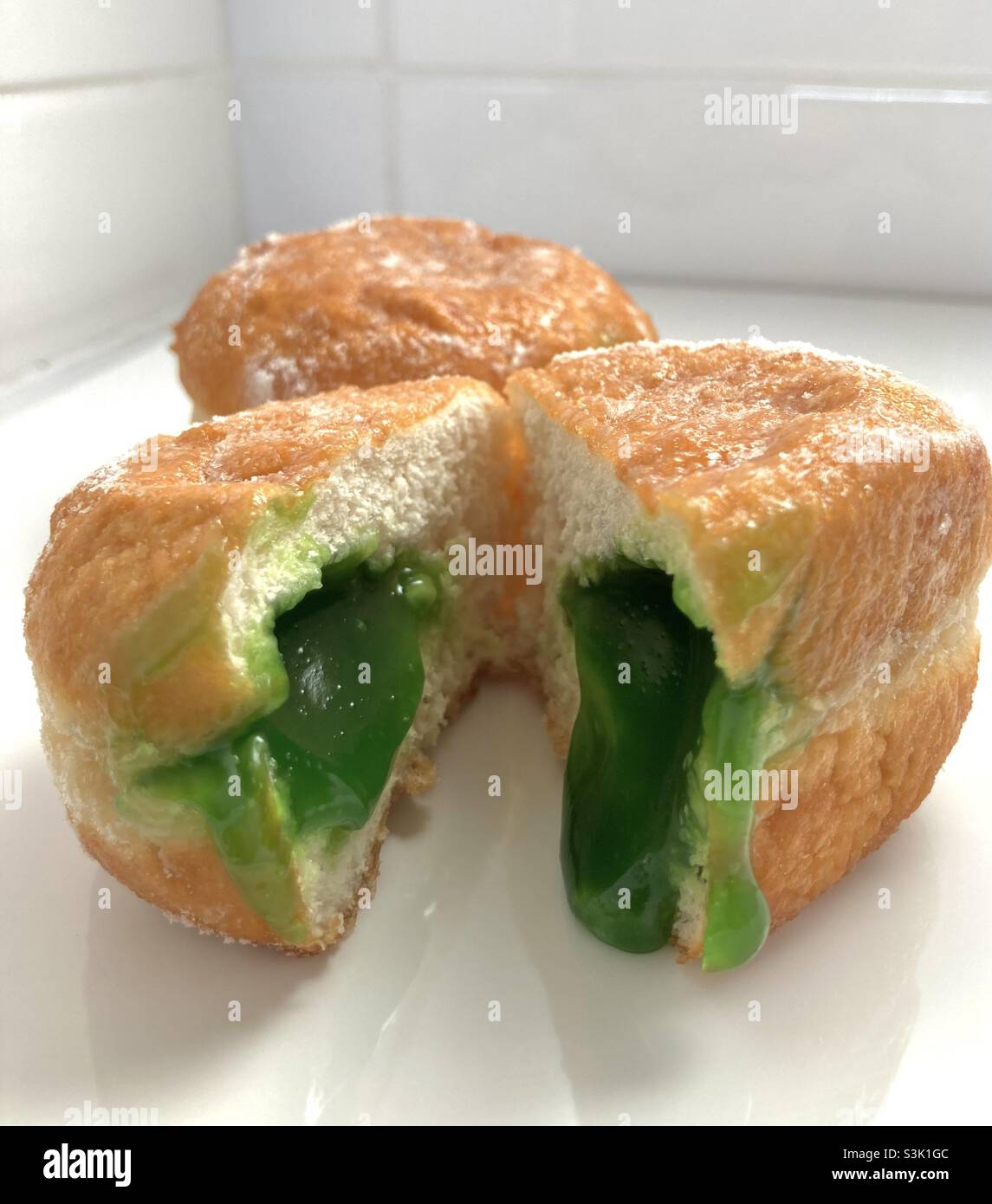 Halloween green slime jam doughnut Stock Photo - Alamy