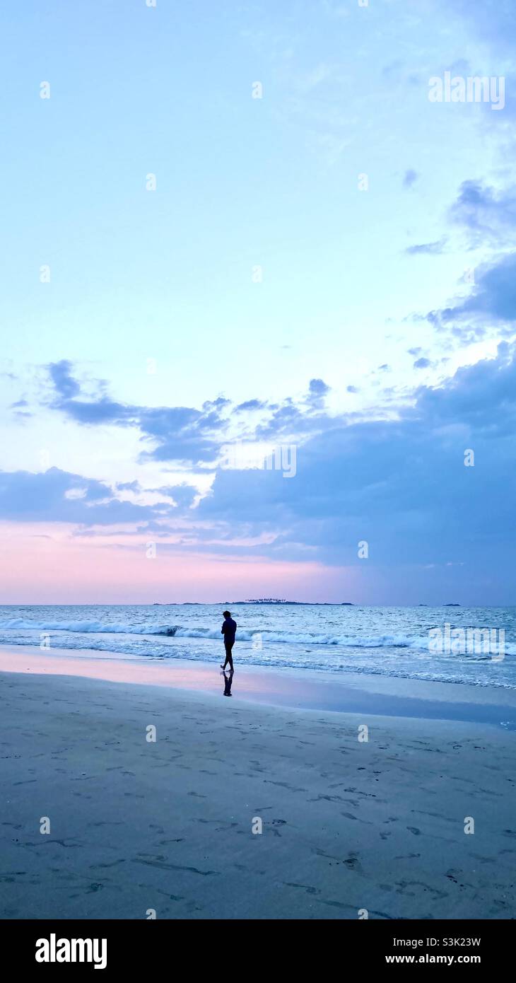 Beach walk waves hi-res stock photography and images - Alamy
