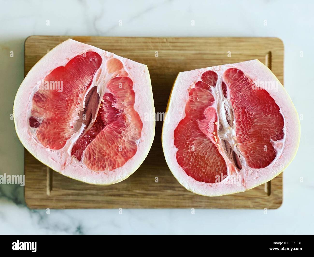 Chinese red grapefruit Stock Photo - Alamy