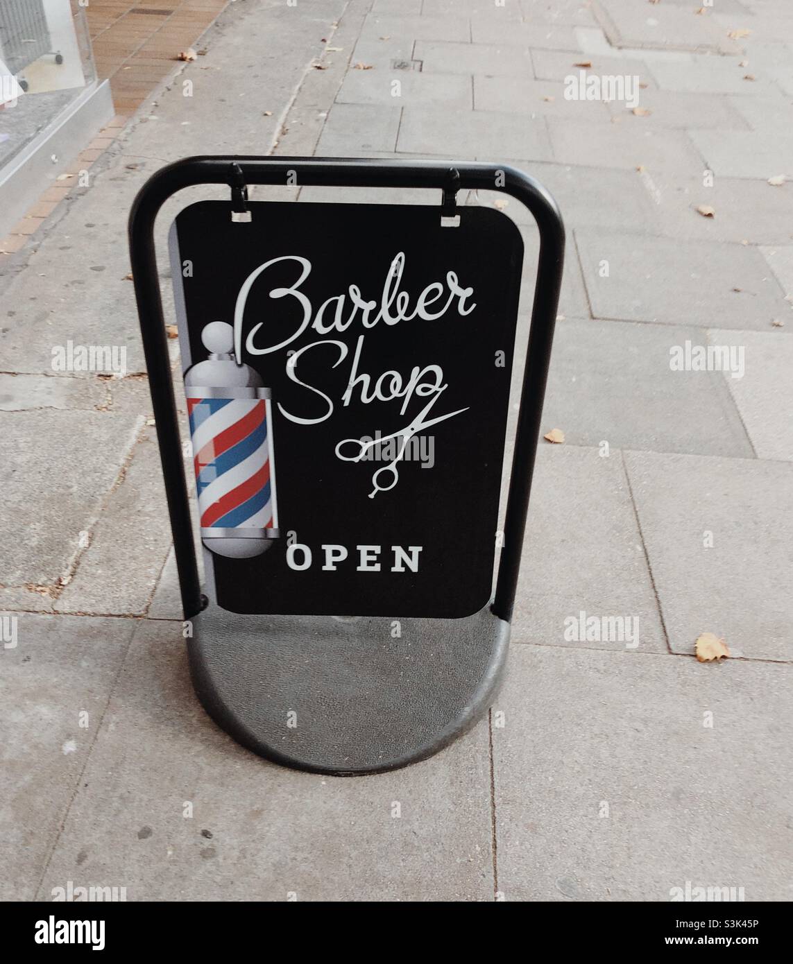 Barbershop open sign Stock Photo - Alamy