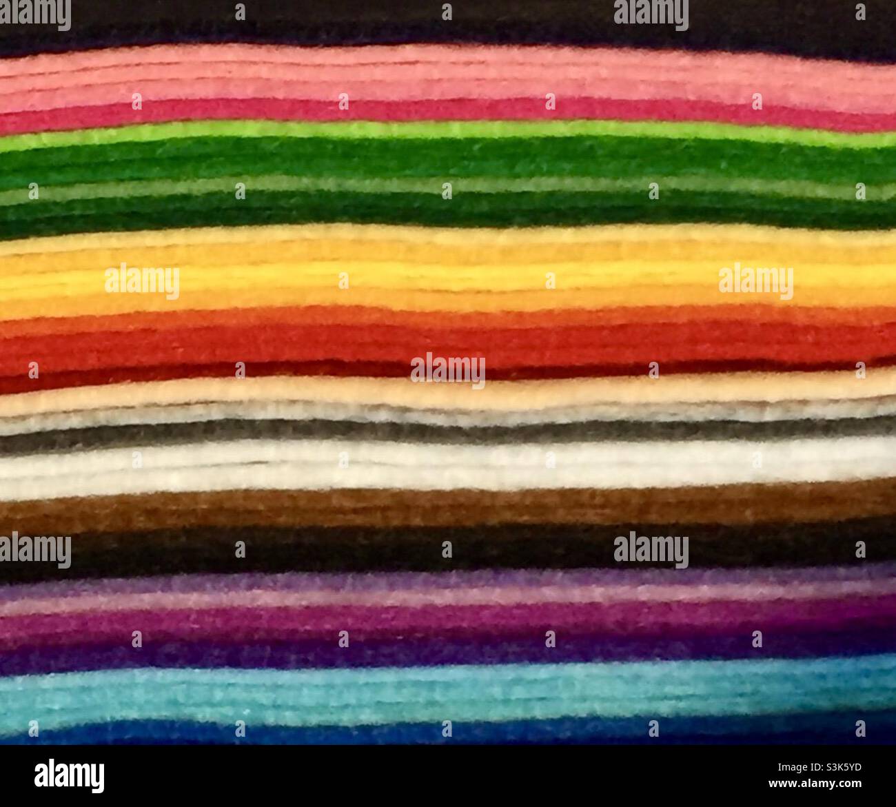 Layers of coloured felt Stock Photo - Alamy