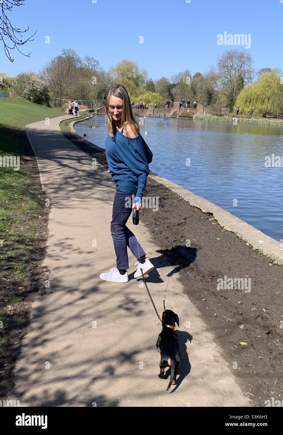 Lady walk dog hi-res stock photography and images - Alamy