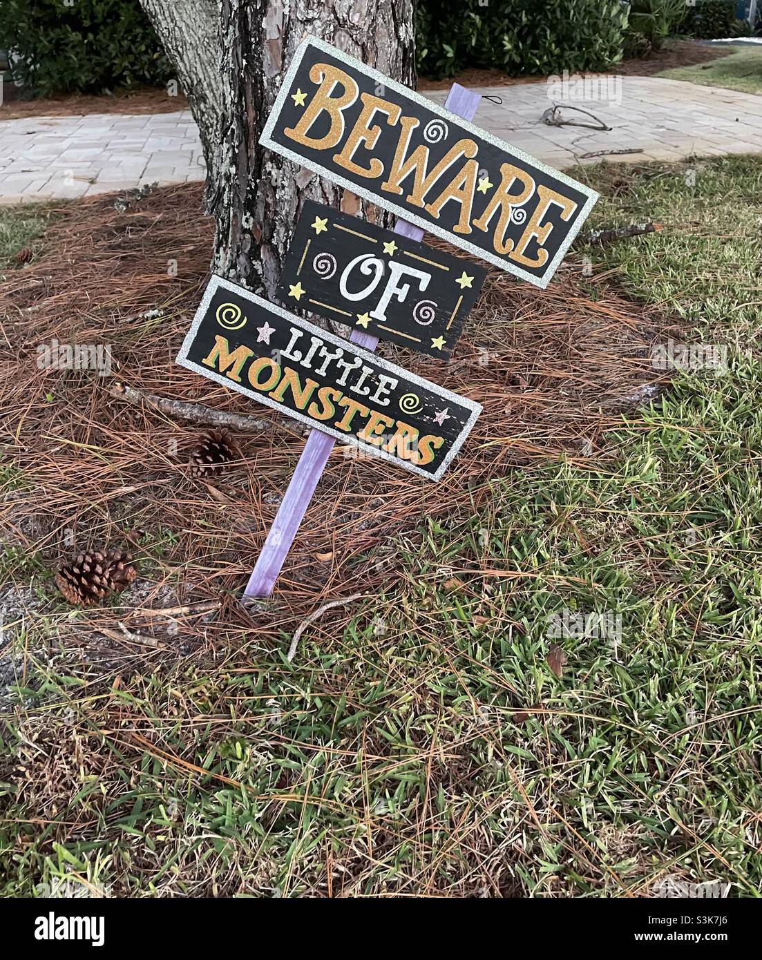 Halloween sign beware of little monsters Stock Photo - Alamy