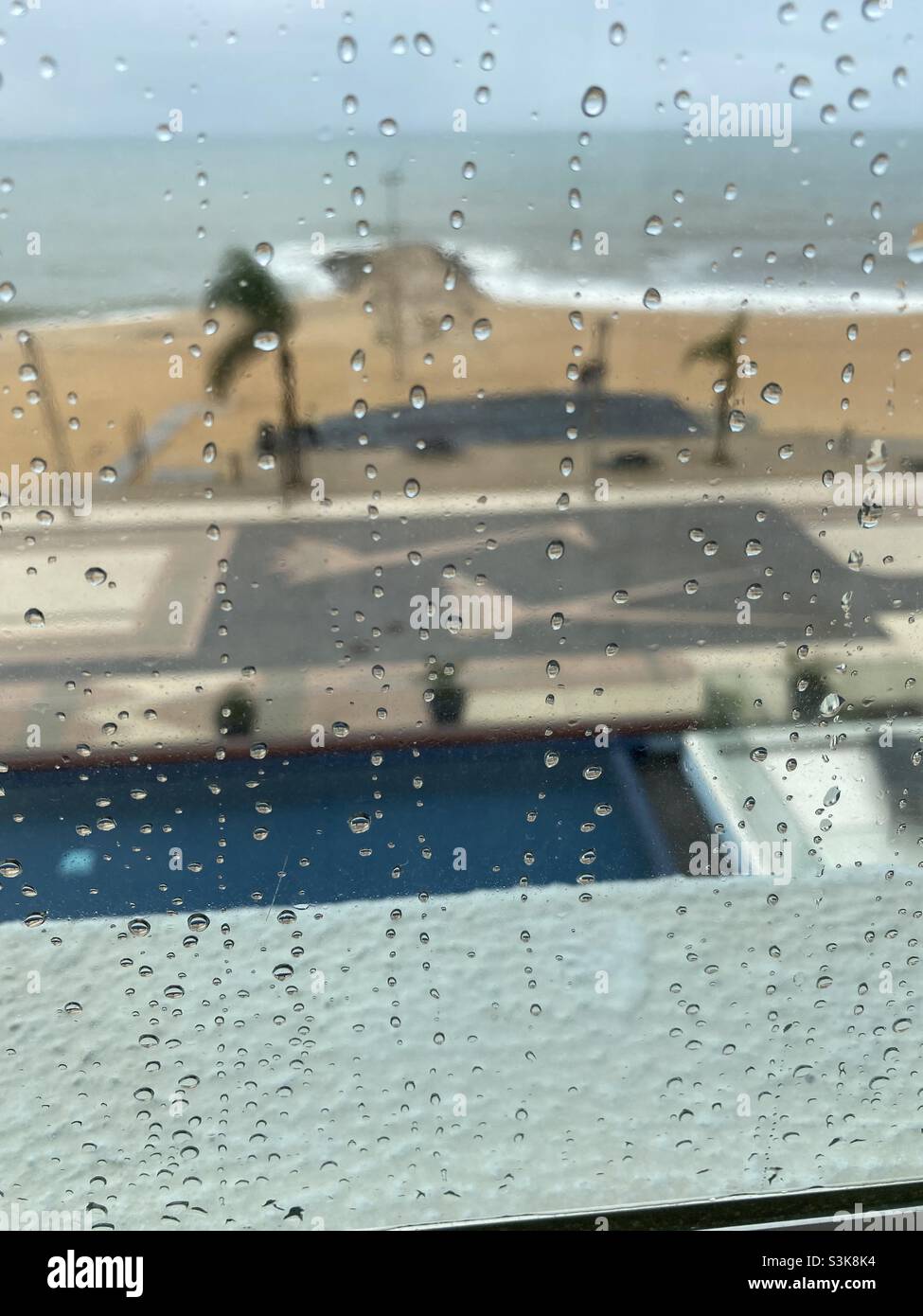 Wet day at the beach Stock Photo - Alamy