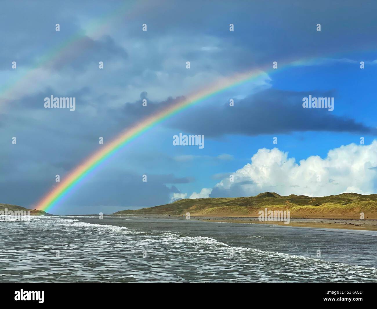 Rainbow over Llangennith beach, Gower, South West Wales, October Stock ...