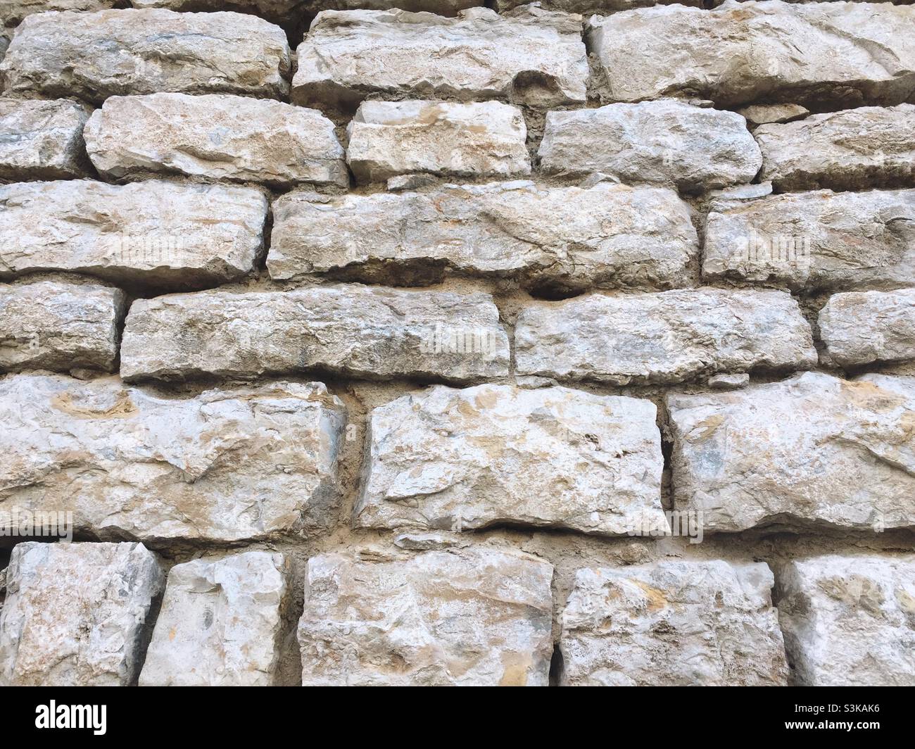 Old stone wall background Stock Photo - Alamy
