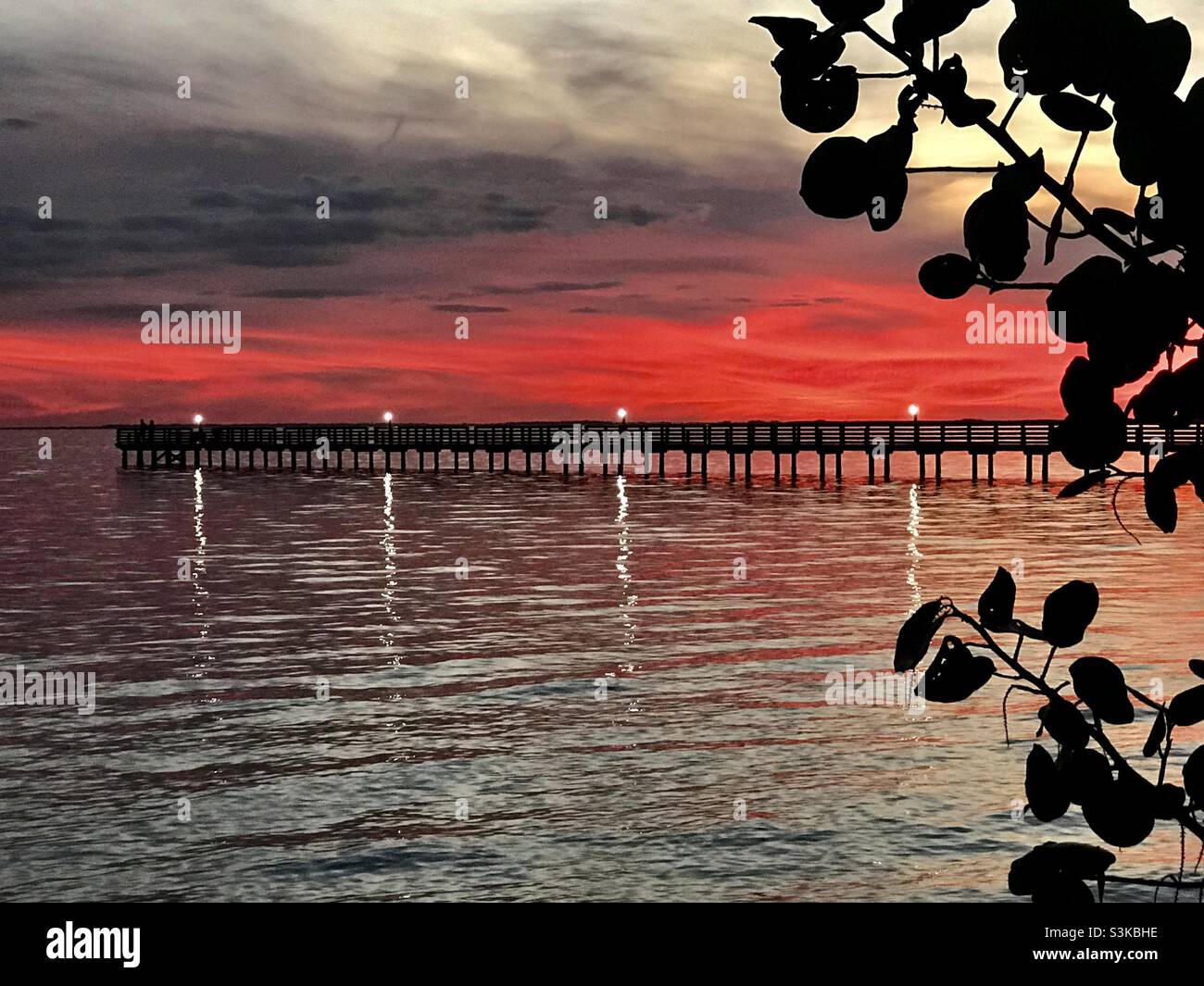 Sunset over the dock Stock Photo - Alamy
