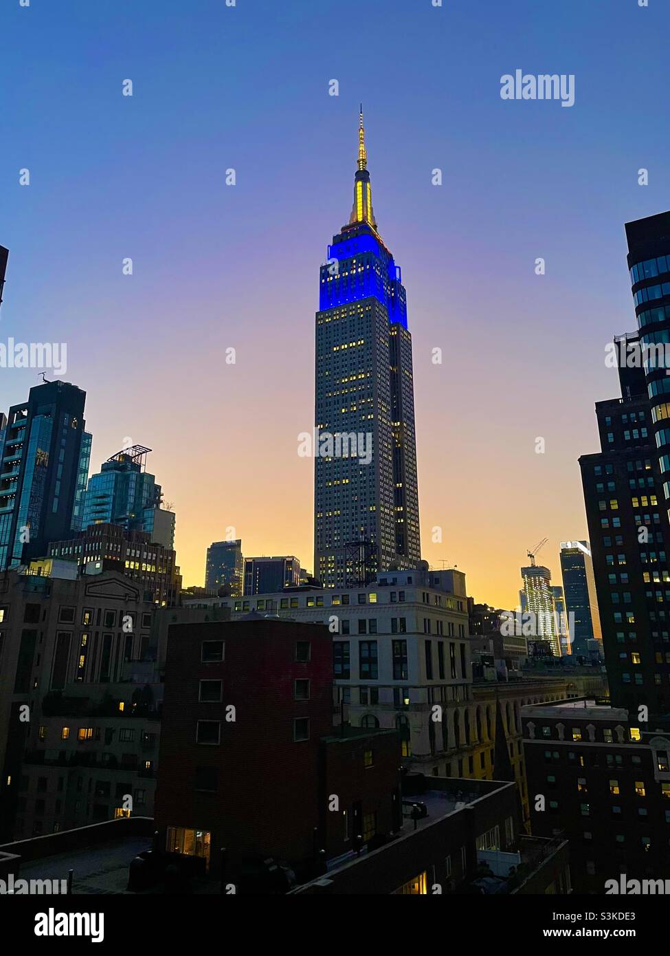 Blue & gold Tower Lights on the Empire State Building honoring the NYC ...