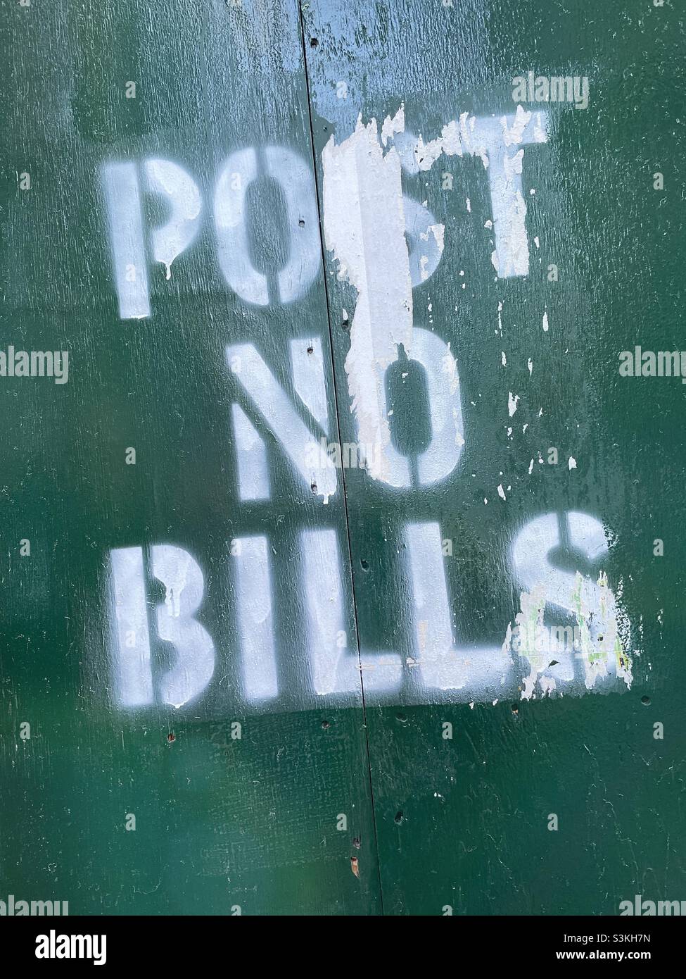 Post no bills stencil on a green wooden wall, New York City, United ...