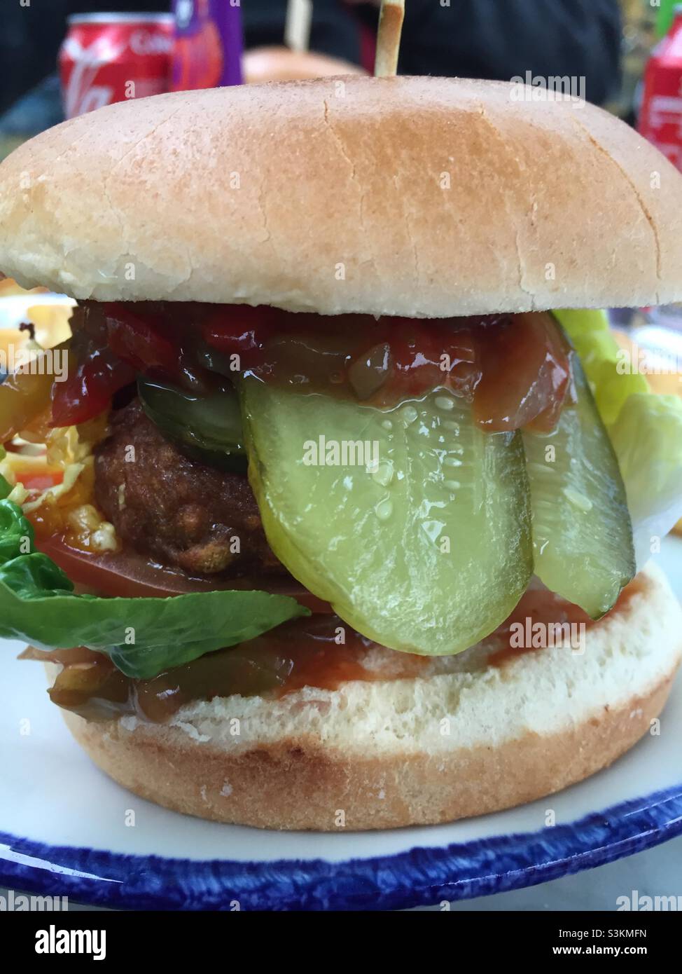 Vegan burger with gerkins Stock Photo - Alamy