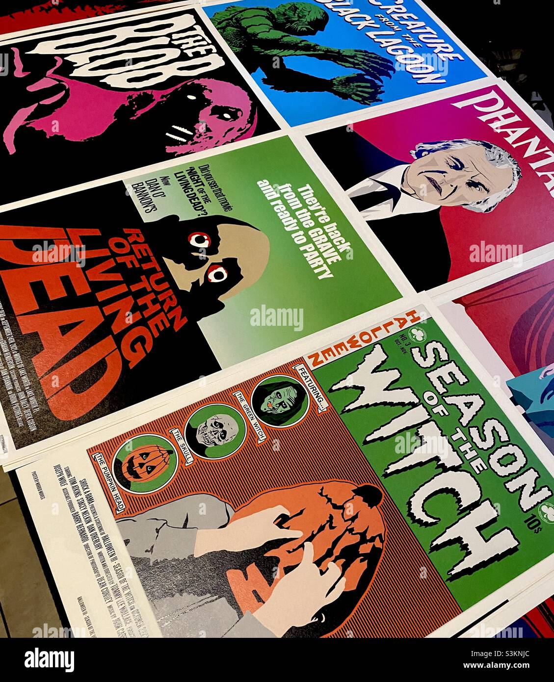 Horror movie posters on display at a movie theatre Stock Photo - Alamy